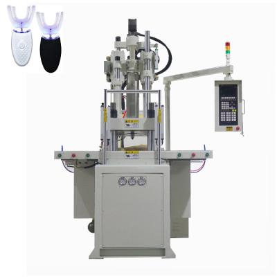 Cina 85 tonnellate Doppel-Slide Verticale Iniezione Stampaggio macchina per la realizzazione di apparecchiature di bellezza dentale in vendita
