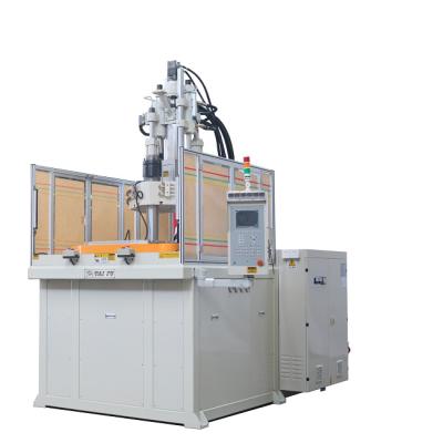 China Máquina de moldeo por inyección de plástico rotativo vertical de precio barato para hacer juguete en venta
