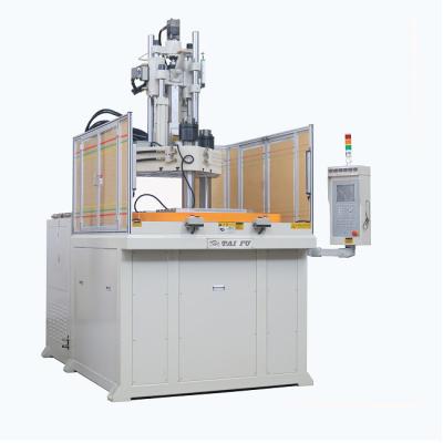 China Máquina de moldeo por inyección de plástico rotativo vertical de precio barato para hacer juguete en venta