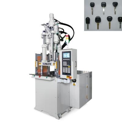 China Energiebesparende 35 ton Verticale standaard plastic spuitgietmachine voor sleutel Te koop