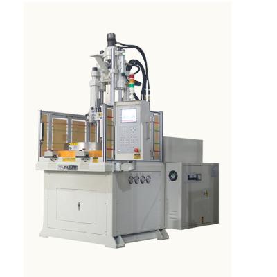 Cina Prezzi bassi rotante verticale plastica macchina di stampaggio a iniezione per la fabbricazione di spina in vendita