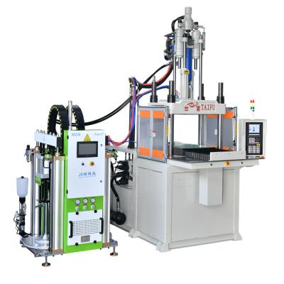 Cina Macchina per lo stampaggio a iniezione verticale di silicone liquido ad alta efficienza per la fabbricazione di custodie per telefoni in vendita