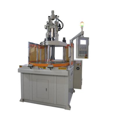 China Cheap Price Rotary Vertical Plastic Injection Molding Machine For Making Filter Te koop