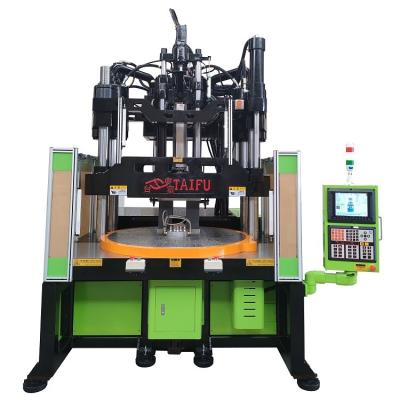 Cina 1176KN Clamping Force Rotary Table Injection Molding Machine for Ejector Distance 100mm in vendita