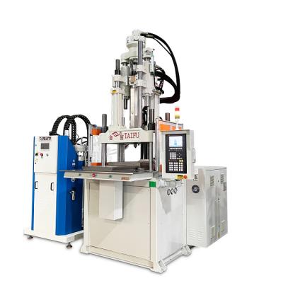 Cina Macchina per lo stampaggio a iniezione verticale di silicone liquido ad alta efficienza per la produzione di giocattoli di silicone in vendita