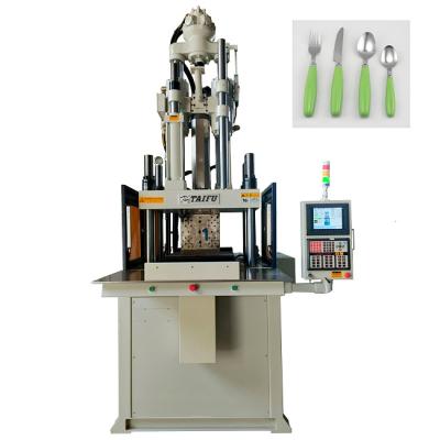 Cina Macchina per stampaggio a iniezione verticale a singolo scivolo ad alta efficienza per la produzione di maniglia in vendita