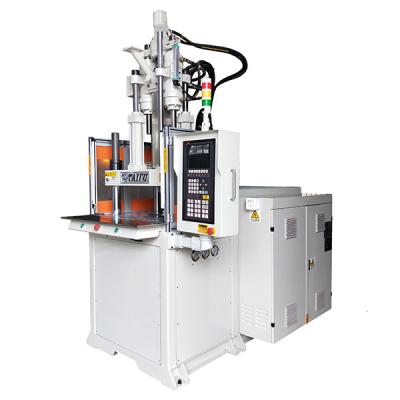 Cina Macchina per stampaggio a iniezione verticale a singola diapositiva da 85 tonnellate per la produzione di adesivi per avvolgimento a vite in vendita