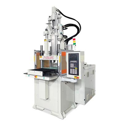 China 85 ton verticale spuitgietmachine voor plastic producten Te koop