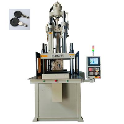 Cina 120 tonnellate singolo scivolo verticale macchina di stampaggio a iniezione per la fabbricazione di chiavi in vendita