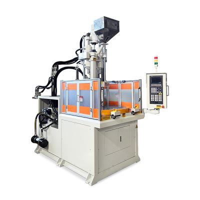 China Máquina de moldeo por inyección de plástico rotativo vertical de alta eficiencia para la fabricación de tacos en venta