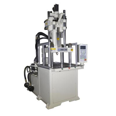 Cina 85 tonnellate Vertical Plastic Product Injection Molding Machine per la fabbricazione di spazzolini da denti in vendita