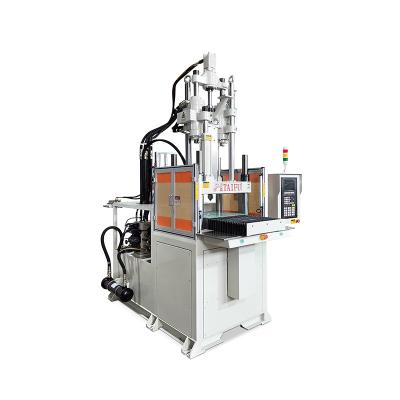 Cina Macchina per stampaggio a iniezione verticale a singolo scivolo ad alta efficienza per la fabbricazione di cucchiai in vendita