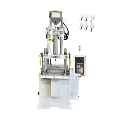 Cina Macchina di stampaggio ad iniezione verticale a singolo scivolo ad alta efficienza per la fabbricazione di ganci in vendita
