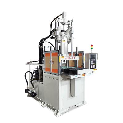 Cina Macchina di stampaggio a iniezione verticale a singolo scivolo ad alta efficienza per la produzione di ganci di plastica in vendita