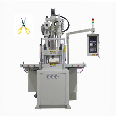 Cina Macchina per stampaggio a iniezione verticale a doppio scivolo da 85 tonnellate per la fabbricazione di utensili da taglio in vendita