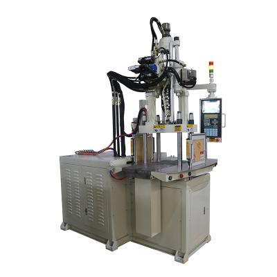 Cina 55 tonnellate Doppia scarica Verticale Stampaggio a iniezione per la produzione di utensili da taglio in vendita