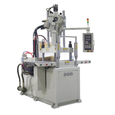 Cina Macchina per stampaggio a iniezione verticale a doppio scivolo da 85 tonnellate per la fabbricazione di utensili da taglio in vendita