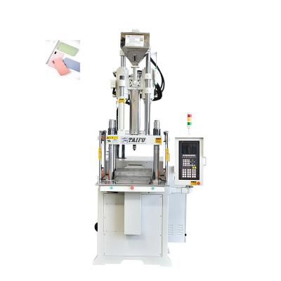 Cina 55 tonnellate singolo scivolo verticale macchina di stampaggio a iniezione per la fabbricazione di custodia del telefono in vendita