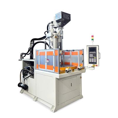 Cina 85 tonnellate rotativa Verticale Plastic Injection Molding Machine per la fabbricazione di prodotti per bambini in vendita
