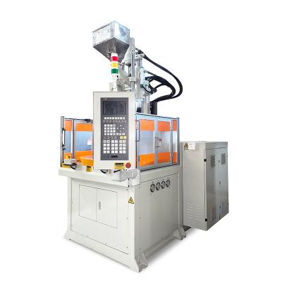 Cina 85 tonnellate rotativa Verticale Plastic Injection Molding Machine per la fabbricazione di prodotti per bambini in vendita