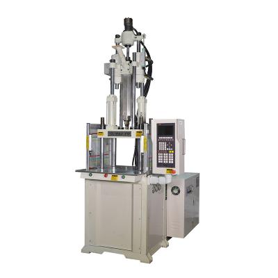 China Máquina de moldagem por injecção vertical padrão de 55 toneladas para fabricação de fecho à venda