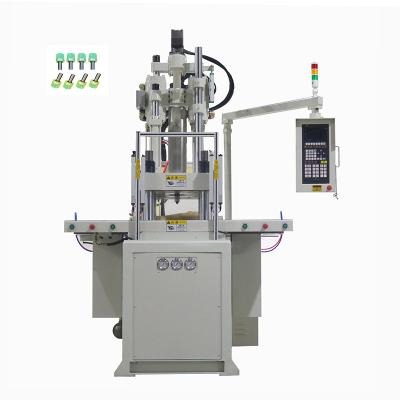 Cina Macchina per stampaggio a iniezione verticale a doppio scivolo da 85 tonnellate per la fabbricazione di chiodi in vendita