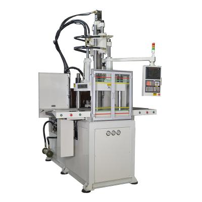 China Máquina de moldeo por inyección vertical de doble deslizamiento de alta eficiencia para hacer filtros en venta