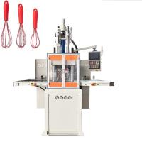 China HIGH EFFICIENCY DOUBLE SLIDE VERTICAL INJECTION MOLDING MACHINE FOR MAKING EGGBEATER for sale