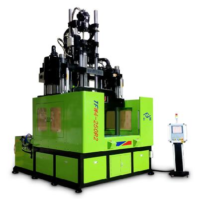 China 250 Ton Low Work Table Vertical Injection Molding Machine For Making Skateboard for sale