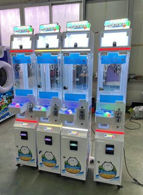 China mini claw machine toys world claw crane machine toy claw machine with top box for sale