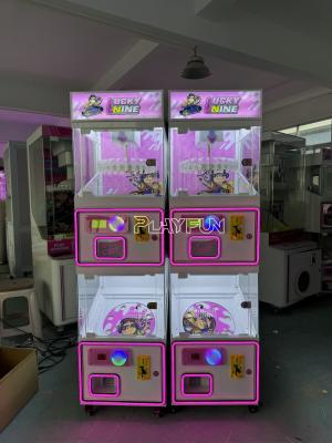 China Hot Sale Probability Controllable Amusement 2 in 1 Lucky Nine Mini 24 Clip Prijs Klem en Capsule Ball Gift Game Machine Te koop
