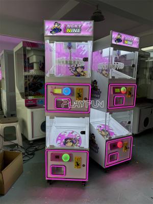 China Hot Sale Probability Controllable Amusement 2 in 1 Lucky Nine Mini 24 Clip Prijs Klem en Capsule Ball Gift Game Machine Te koop