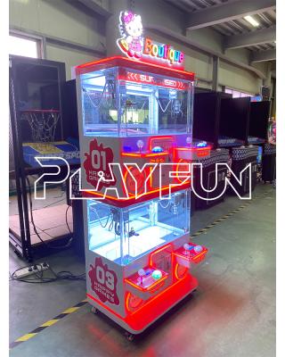 Cina Logo personalizzato Mini giochi di gru di artiglieria boutique premio gioco mini bambino buon spettacolo 4 giocatori mini macchina di artiglieria bambino in vendita in vendita