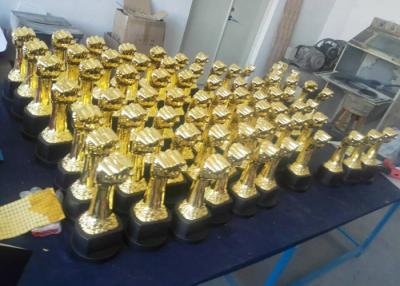 China Handmade Custom Trophy Cup Gold Plated In Boxing Matches Victory Fist Shape for sale