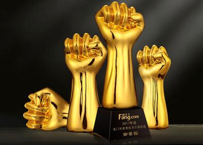 China Fist Shape Resin Trophy Cup Gold Electroplated For Outstanding Staff / Employees for sale