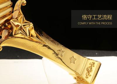 China Shiny Gold Plated Resin Trophy Cup For Winners Custom Logo Accepted for sale