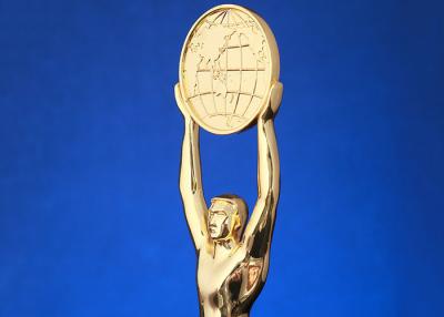 China Engraved Custom Metal Trophies Man Figure Holding World Map By 3D Printing for sale