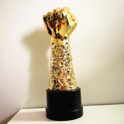 Cina Premi dorati del personale di Fist Trophy Company di polyresin del regalo del ricordo in vendita