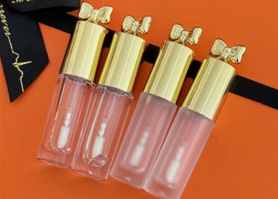 China Custom Logo 2.5ml Golden bow tie Top Lipgloss tube For Comestic Packaging for sale