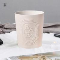 China Matte Embossed Ceramic Candle Jar 8oz 10oz with Wooden Lid Wholesale Custom Colors for sale