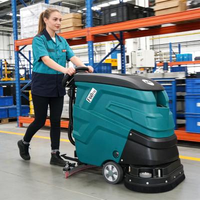 China Battery Powered Walk Behind Floor Scrubber with 660mm Double Brush 400W Suction Motor for sale