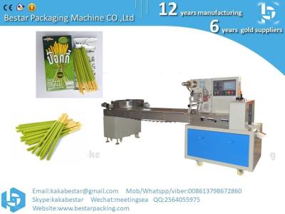 China Automatic Flow Pack Food Packaging Machine for Vegetable Bar Cake Biscuit Coating Finger Biscuit for sale