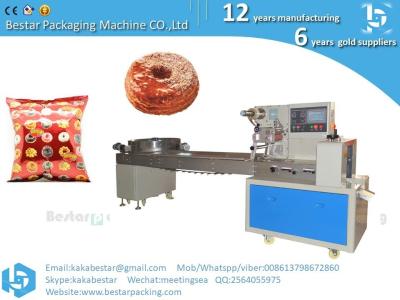 China Automatic packaging machine, doughnut, bread, candy packaging machine, automatic flow packaging machine for sale