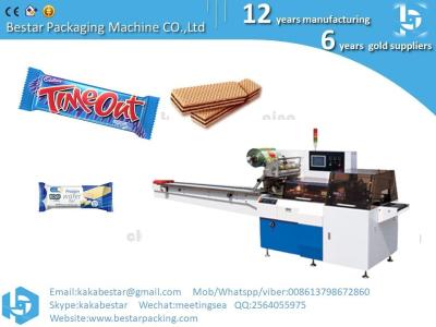China Flow packing machine with automatic feeder, wafer packing machine for sale