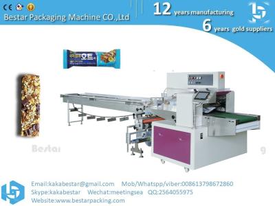 China Full automatic candy packing machineChocolate Bar Packing MachineProtein Bars Packaging Machine for sale