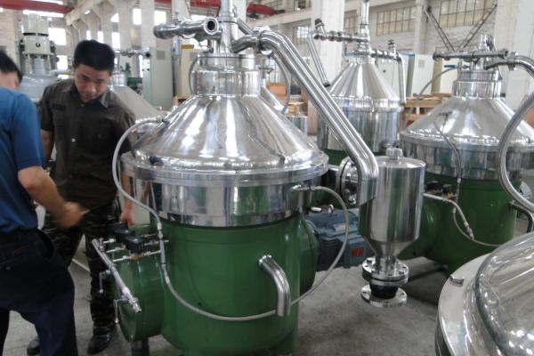 Quality Self-discharging Self-cleaning SS304 solid liquid disc oil separator for sale