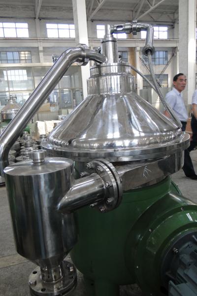 Quality Self-discharging Self-cleaning SS304 solid liquid disc oil separator for sale