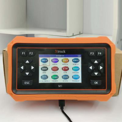 China Escáner de Motocicleta Profesional Xtruck M1 con Pantalla de Estado de Preparación I/M, Guía de Solución de Problemas y Más de 120 Funciones Especiales en venta
