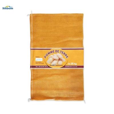 Cina Sacchetto a maglia in legno da ardere in PE riciclabile per arance Stampaggio a caldo Sacchetti a cipolla Leno PP in vendita