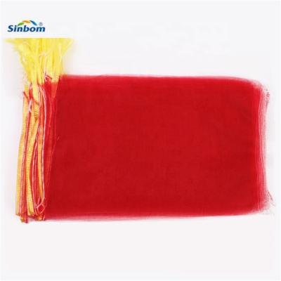 Cina 5kg 25kg 50kg sacchetti di imballaggio per verdure rosse PE Mono mesh sacchetto per cipolle su ordinazione in vendita